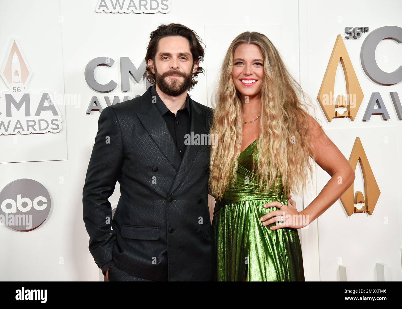 Thomas Rhett, left, and Lauren Akins arrive at the 56th Annual CMA ...
