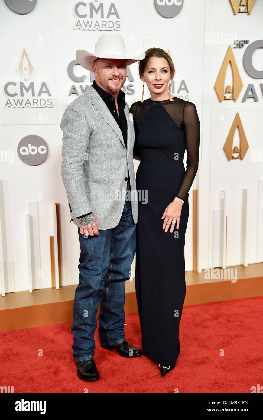 Cody Johnson, left, and Brandi Johnson arrive at the 56th Annual CMA ...