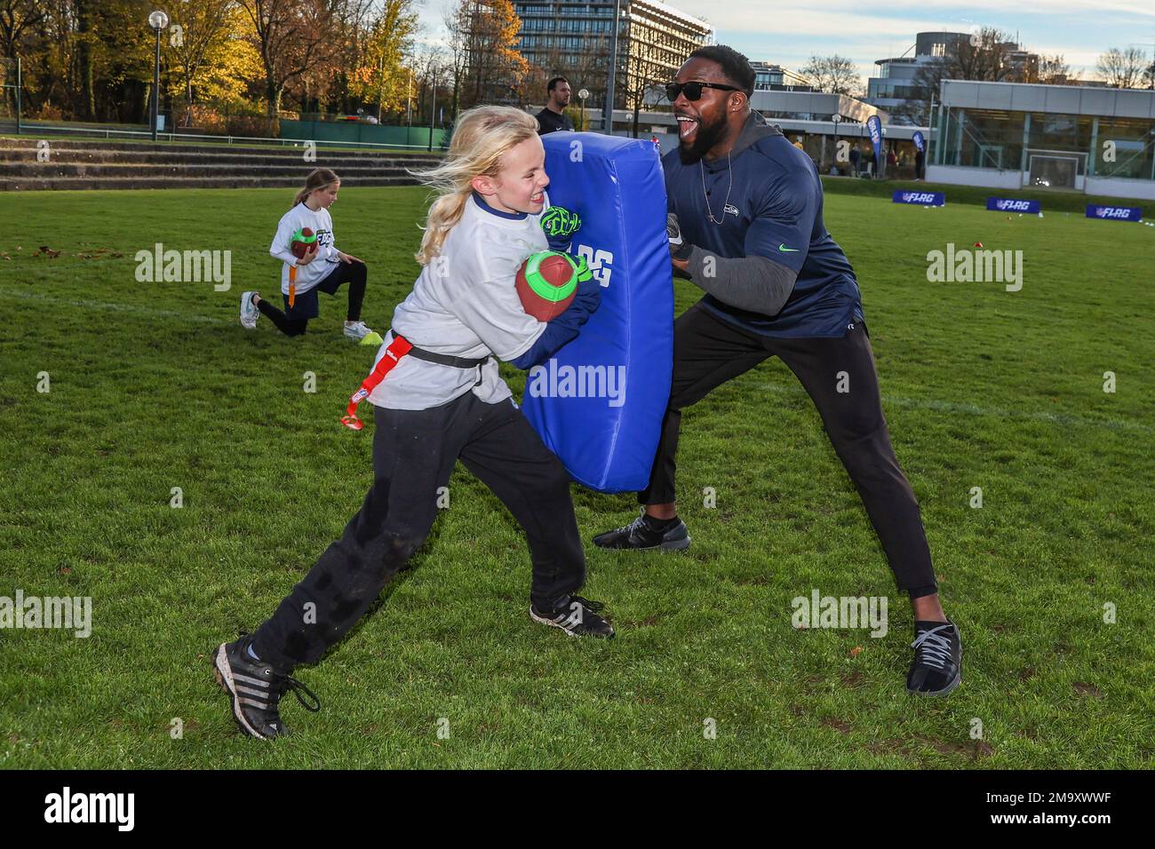 Seattle Seahawks alumnus Robert Turbin coaches youth participating in ...