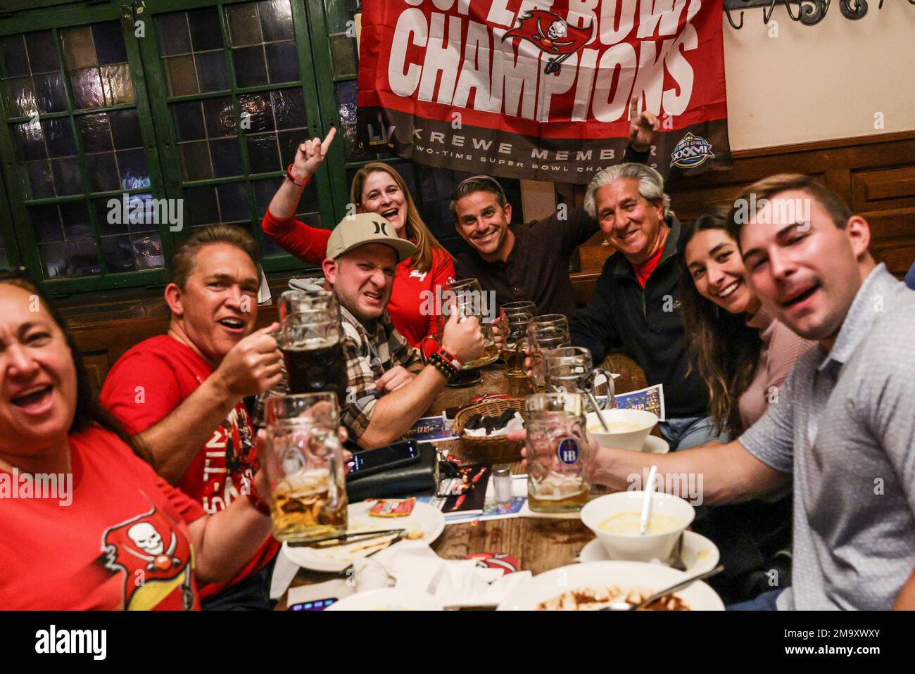 Fans cheer as they pose for a photo, during the Tampa Bay Buccaneers ...