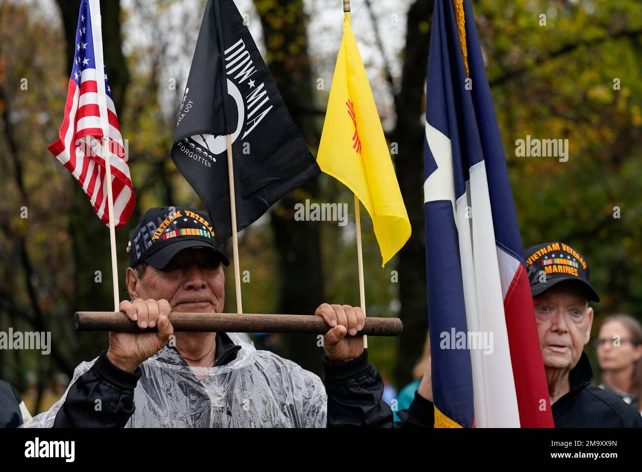 Vietnam veteran Keith Bear, left, from North Dakota, stands with other ...