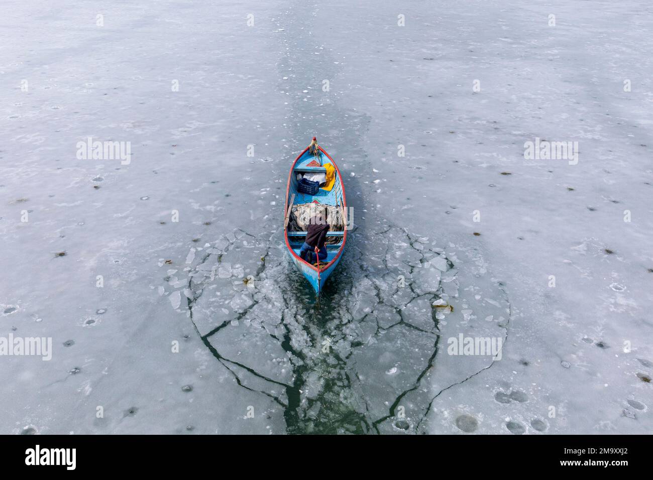 Ice fishermen fishing in frozen hi-res stock photography and images - Alamy