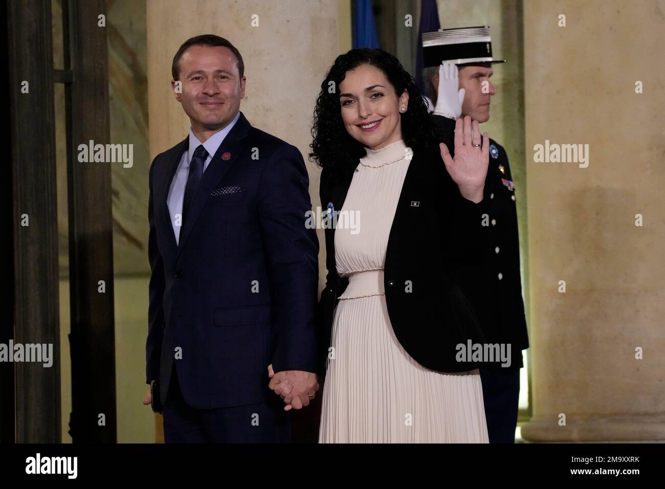 President of Kosovo arrives Vjosa Osmani, right, and her husband ...
