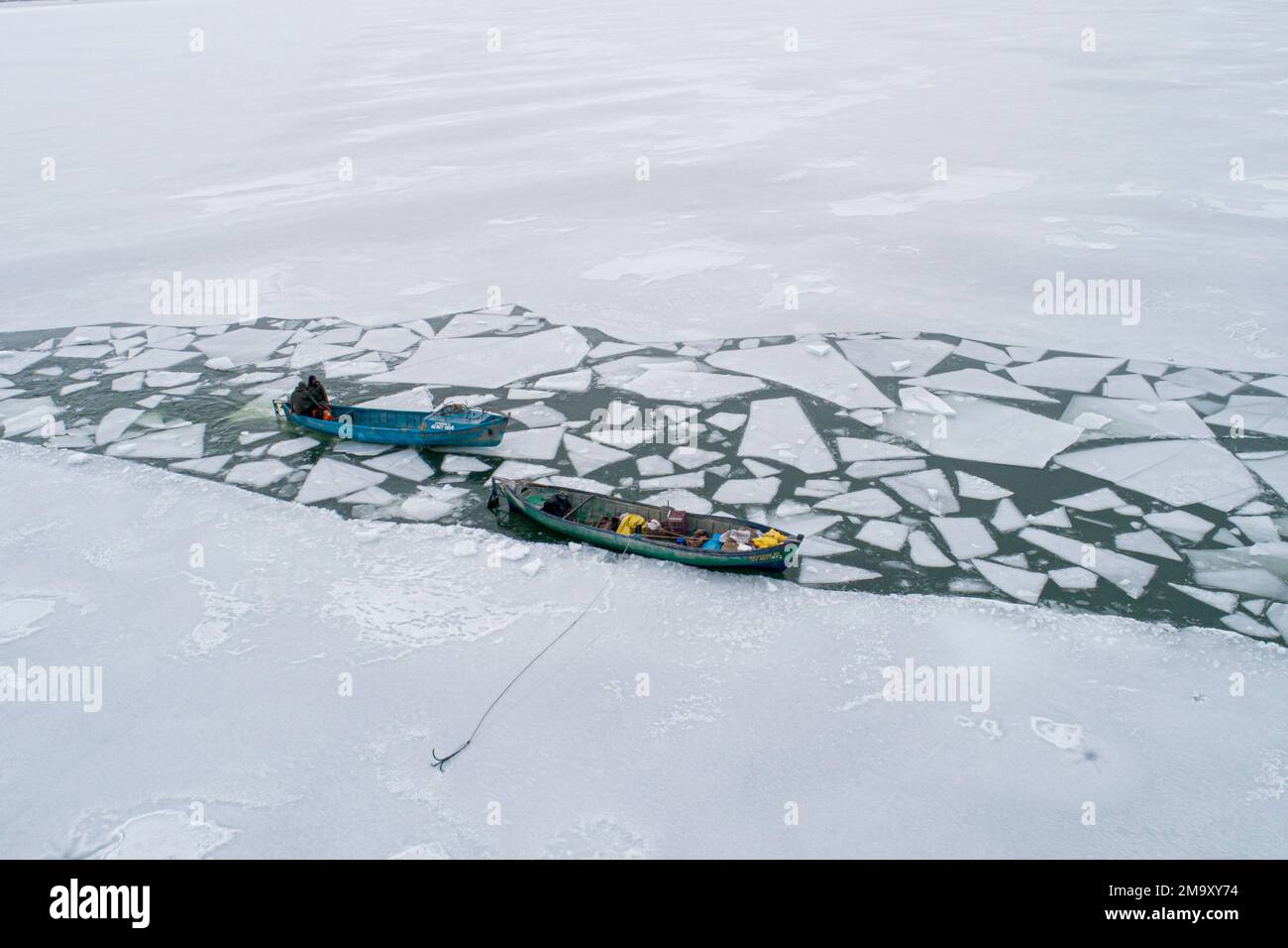 Cracking Ice Expedition Boat Exploration on a Shattered Ice Sheet Stock ...