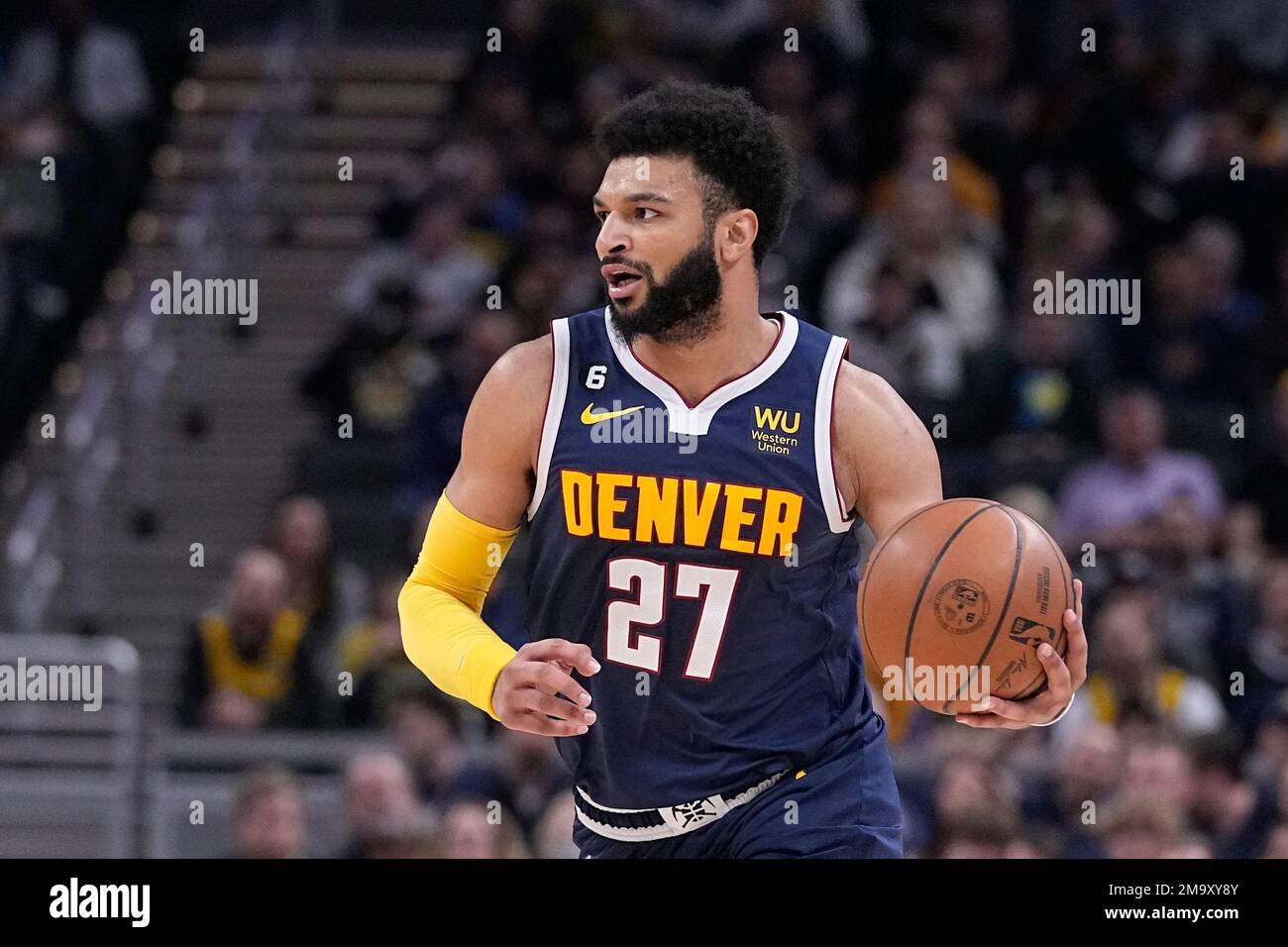 Denver Nuggets' Jamal Murray dribbles during the first half of an NBA ...