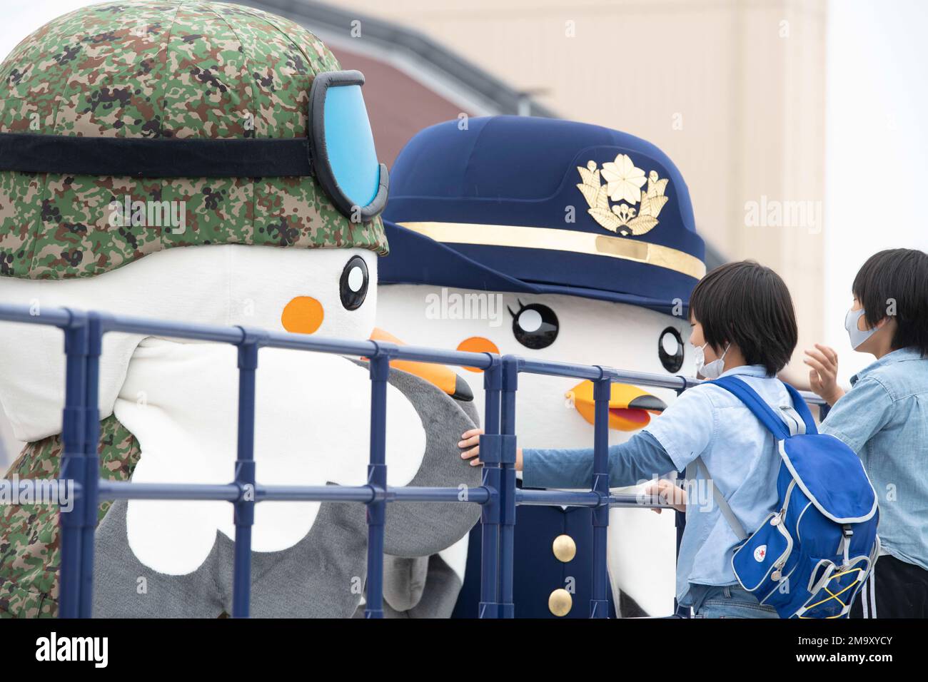 Japanese children interact with mascots for Japan Self-Defense Force ...