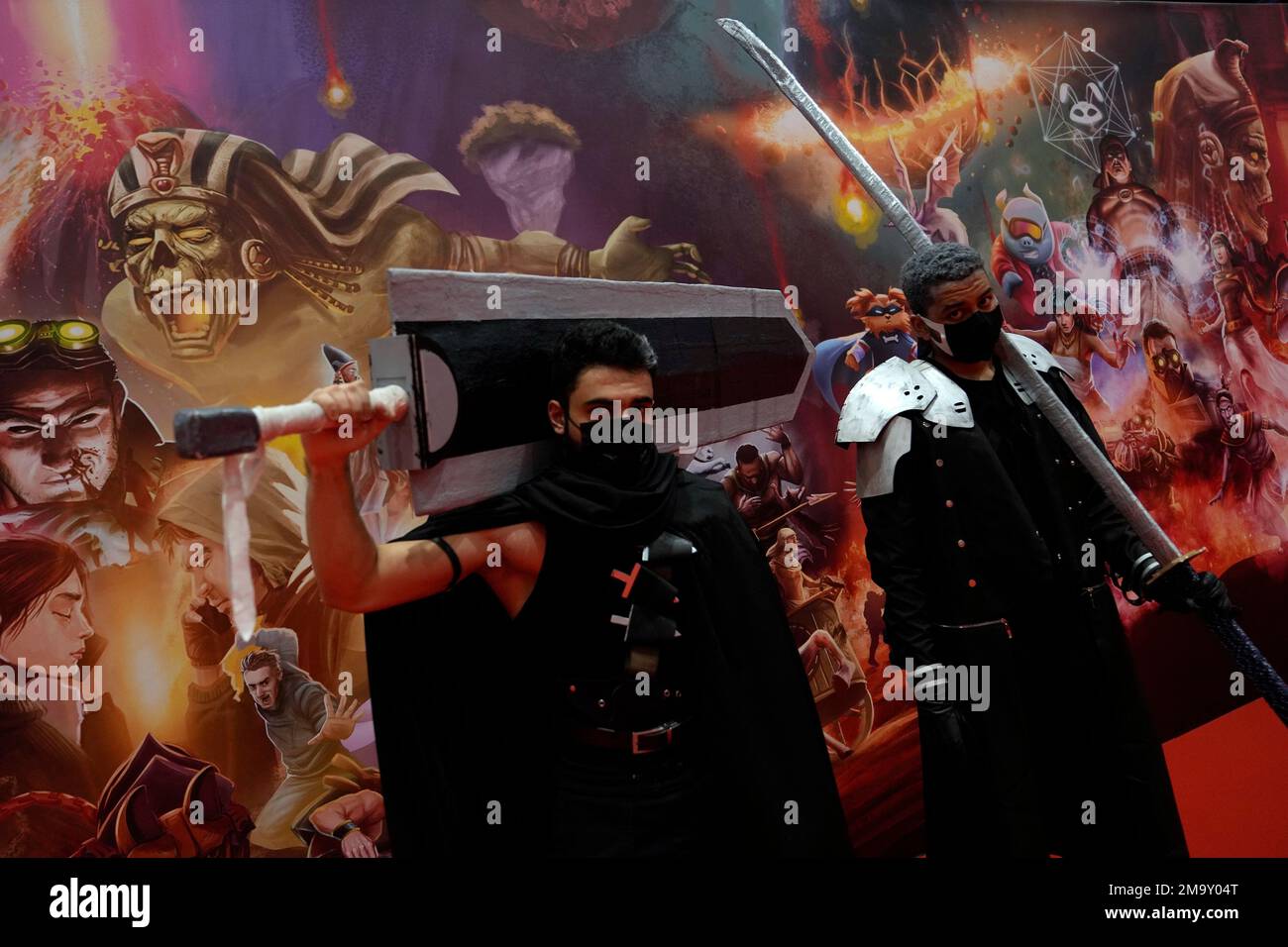 People dressed as Marvel Comics characters attend the PopCon Middle ...