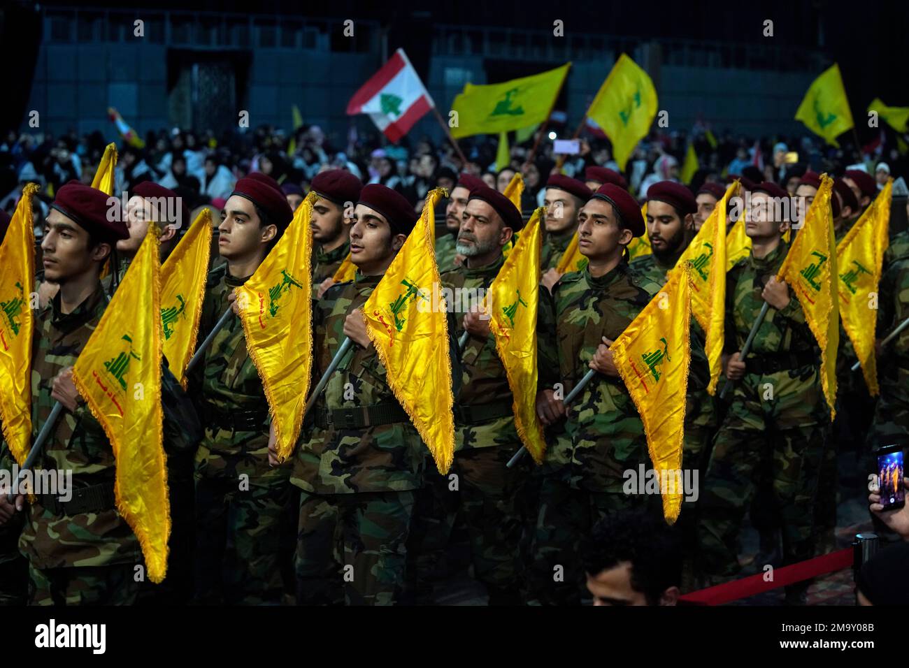 Hezbollah fighters parade during a rally marking Hezbollah Martyr's Day ...