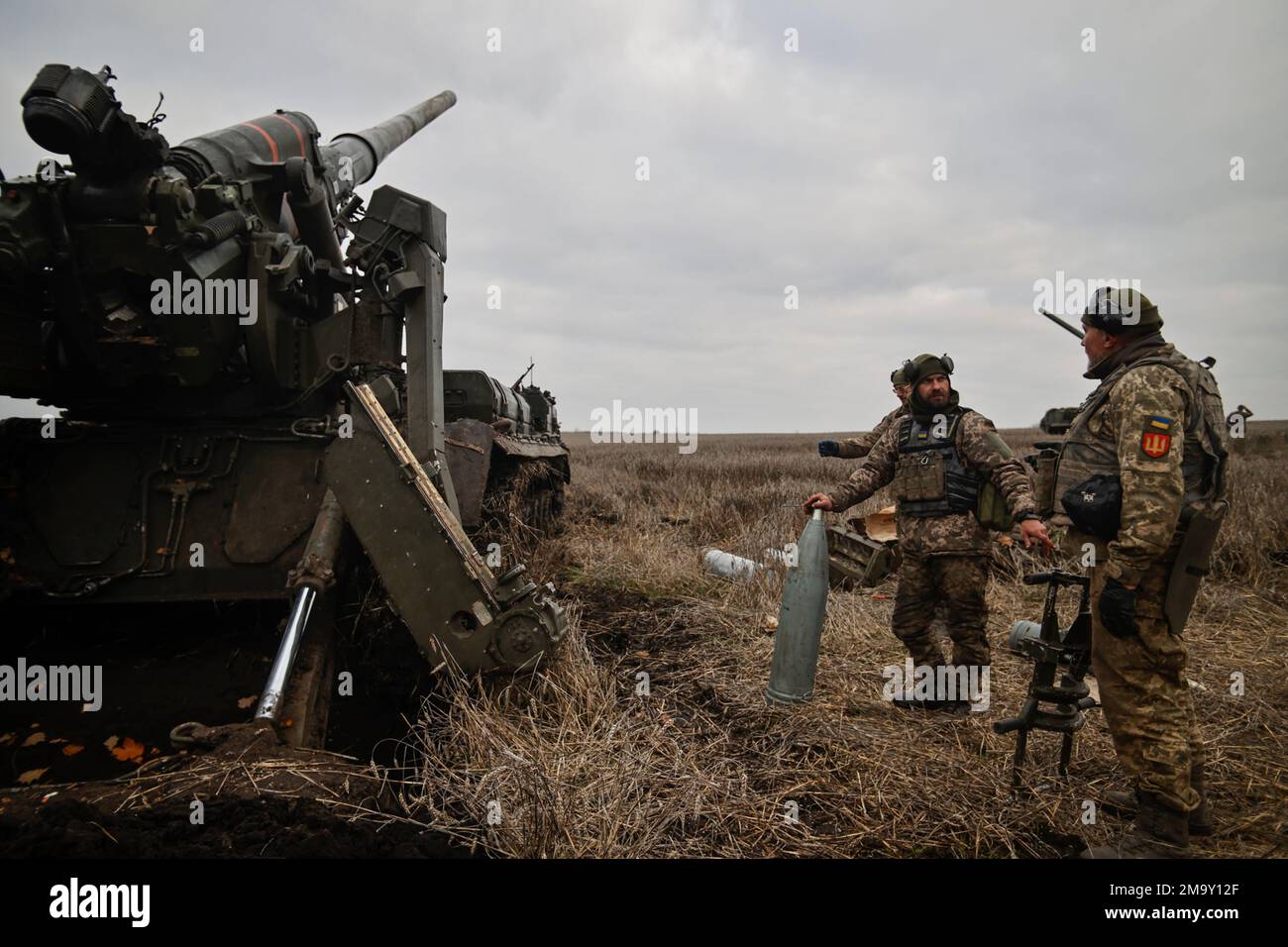 A self-propelled artillery vehicle prepares to fire near Bakhmut ...
