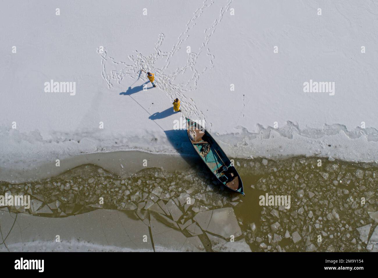 Ice fishermen fishing in frozen hi-res stock photography and images - Alamy