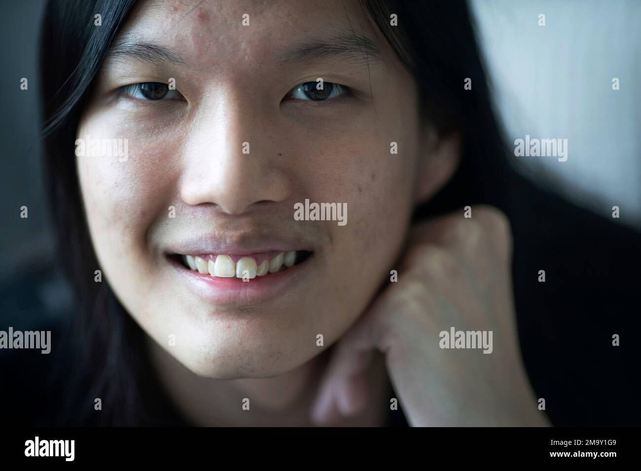 Lune Loh, 25, a transgender woman, poses for a portrait in her home in ...