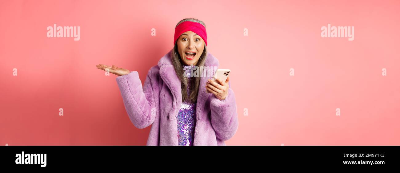 Online shopping and fashion concept. Woman checking out awesome promo ...