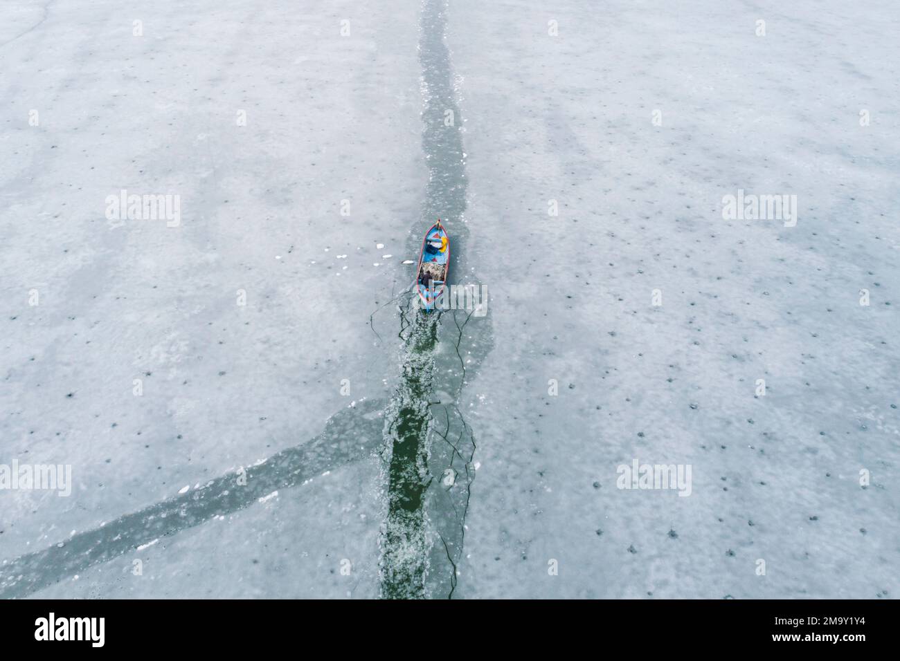 Ice fishermen fishing in frozen hi-res stock photography and images - Alamy