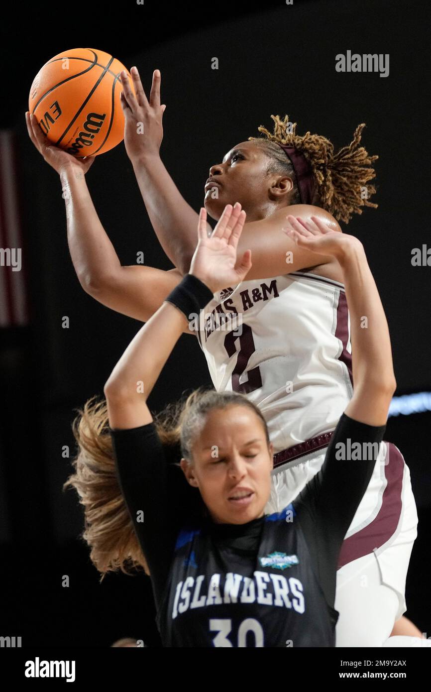 Texas A&M forward Janiah Barker (2) goes to the basket past Texas A&M ...
