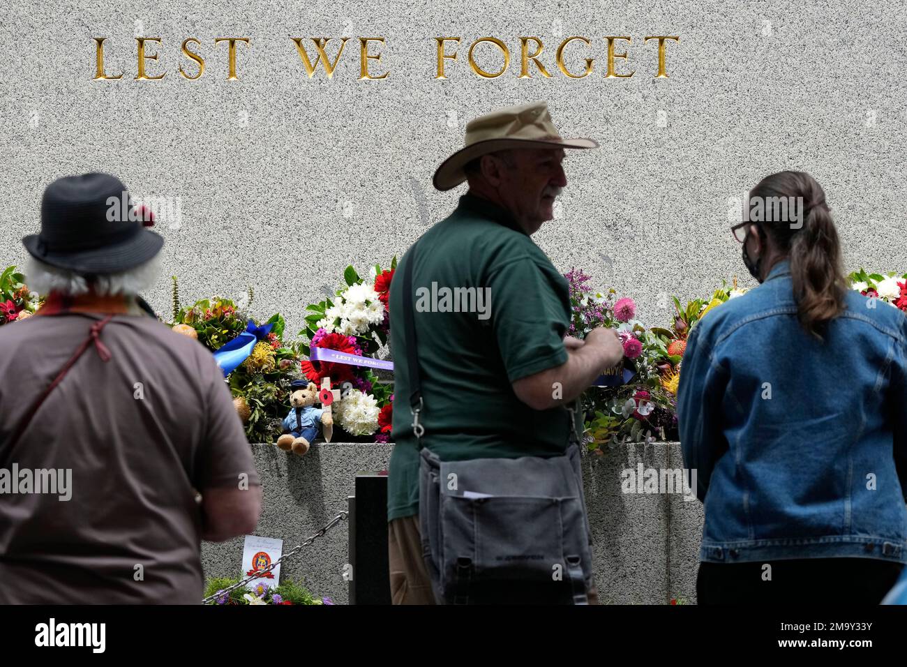 People look at a wreaths and other tributes at the cenotaph following ...