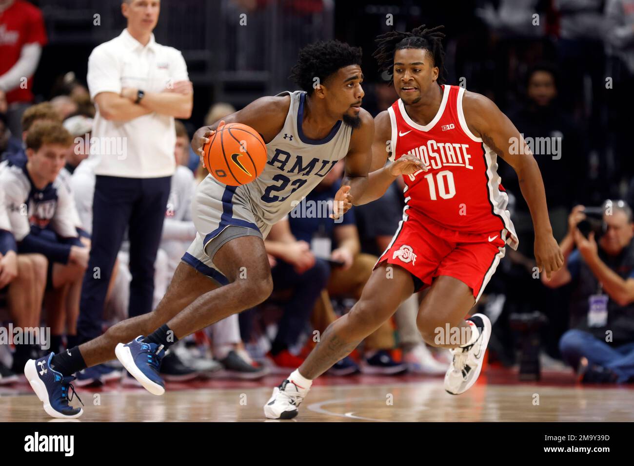 Robert Morris guard Chris Ford, left, drives against Ohio State forward ...