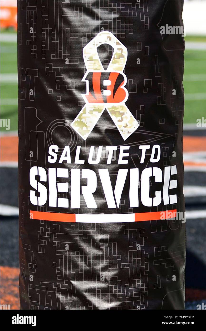 Salute to Service signage is seen during an NFL football game between ...