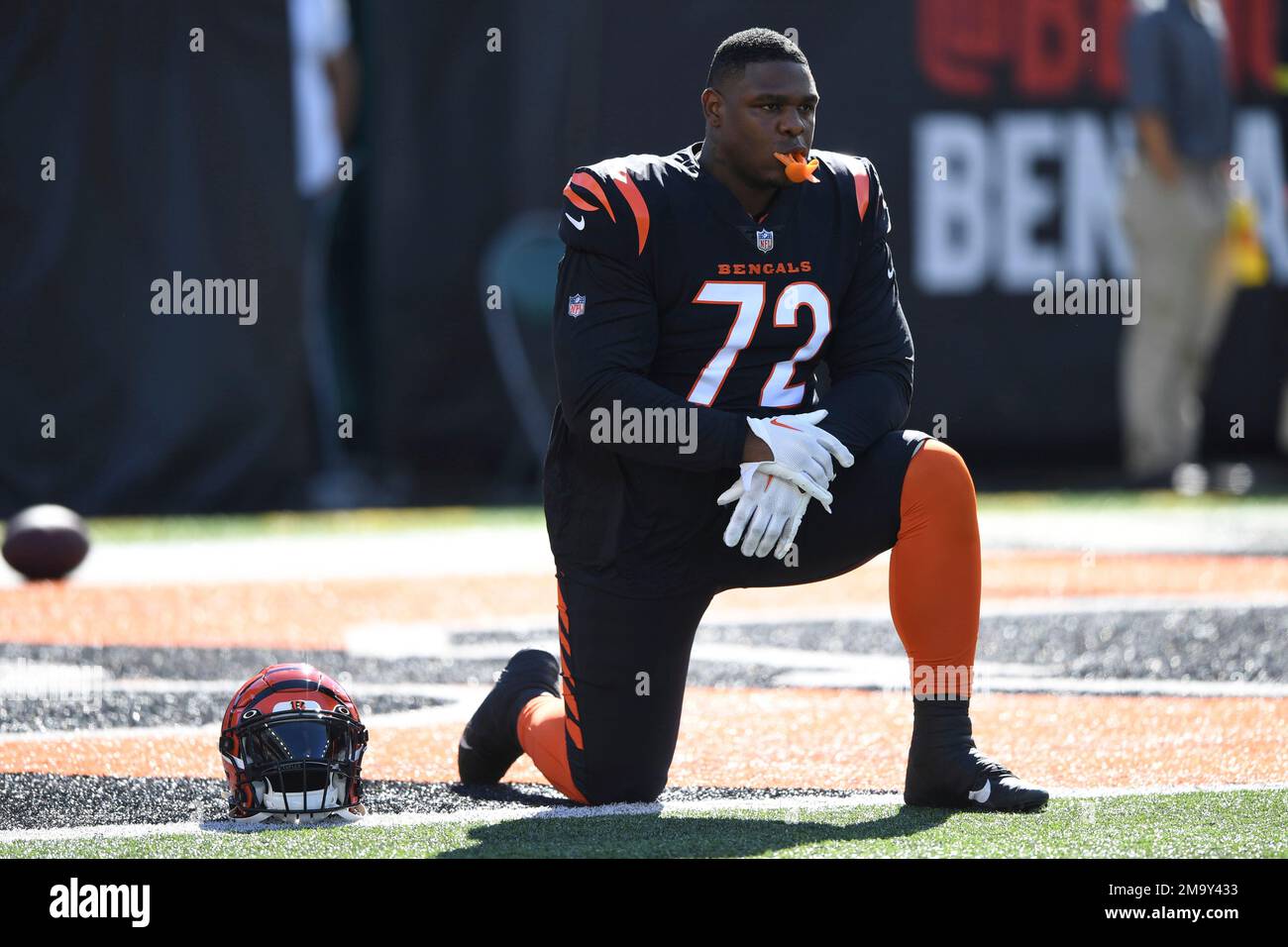 Cincinnati Bengals defensive tackle Dominique Davis (72) warms up ... Cincinnati Bengals defensive tackle Dominique Davis (72) warms up ...