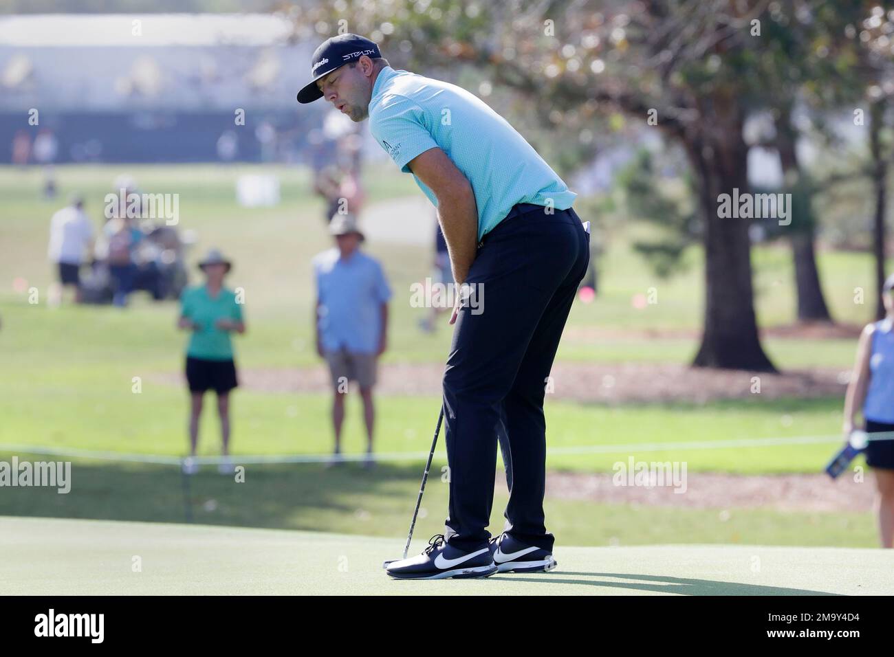 Taylor Montgomery reacts as his ball misses the cup on his 12th green ...