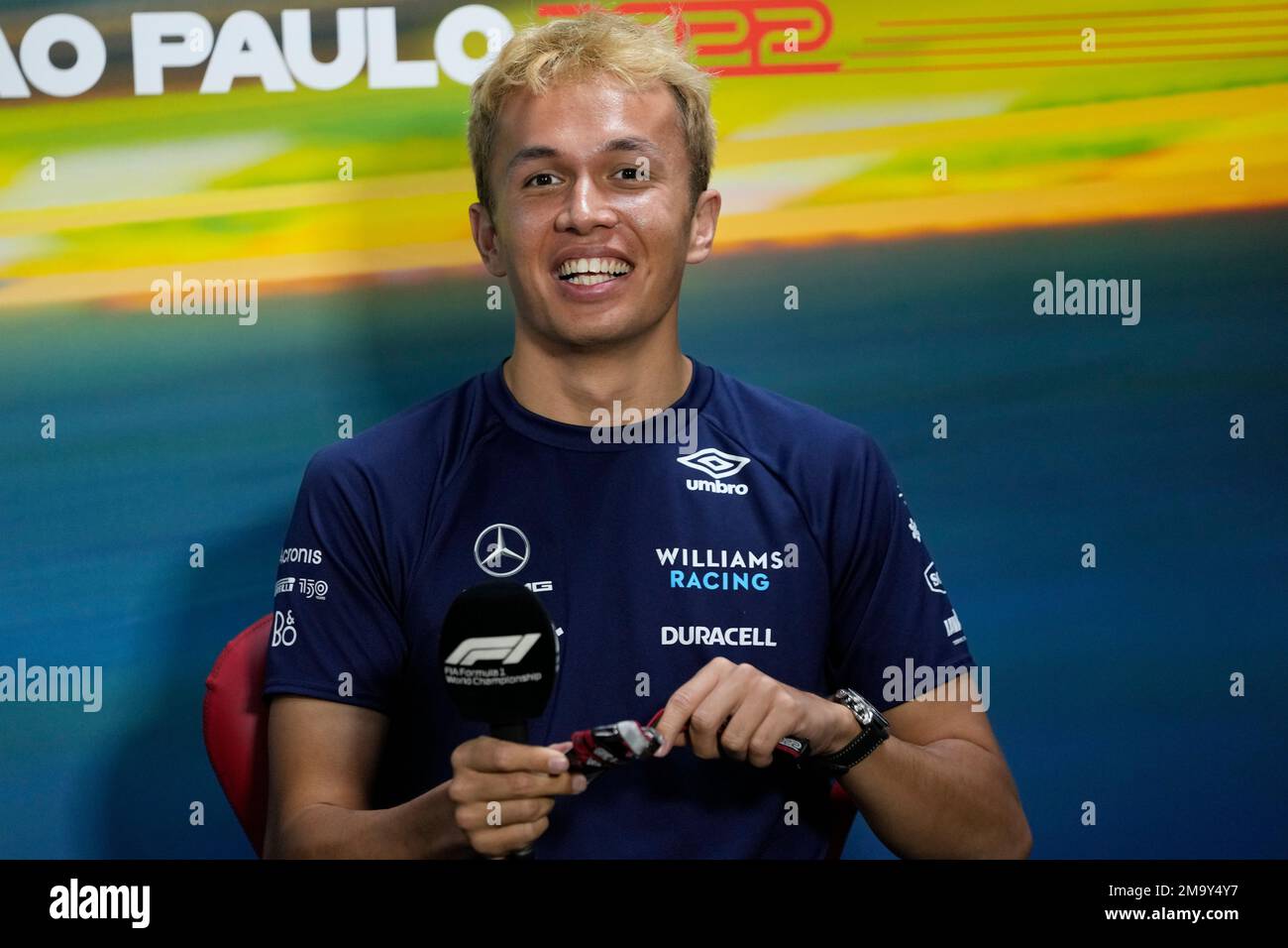 Williams driver Alex Albon, of Britain, smiles during a press ...
