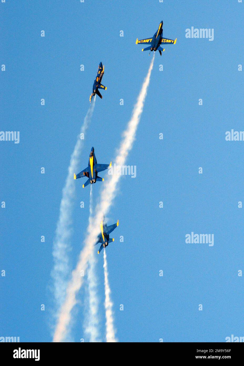 Four US Navy (USN) Blue Angels F/A-18C Hornet aerial demonstration team ...