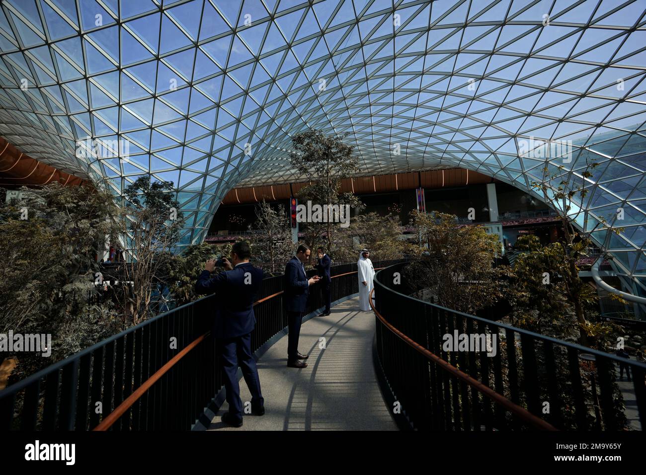 People walk at the new central concourse terminal expansion new airport ...