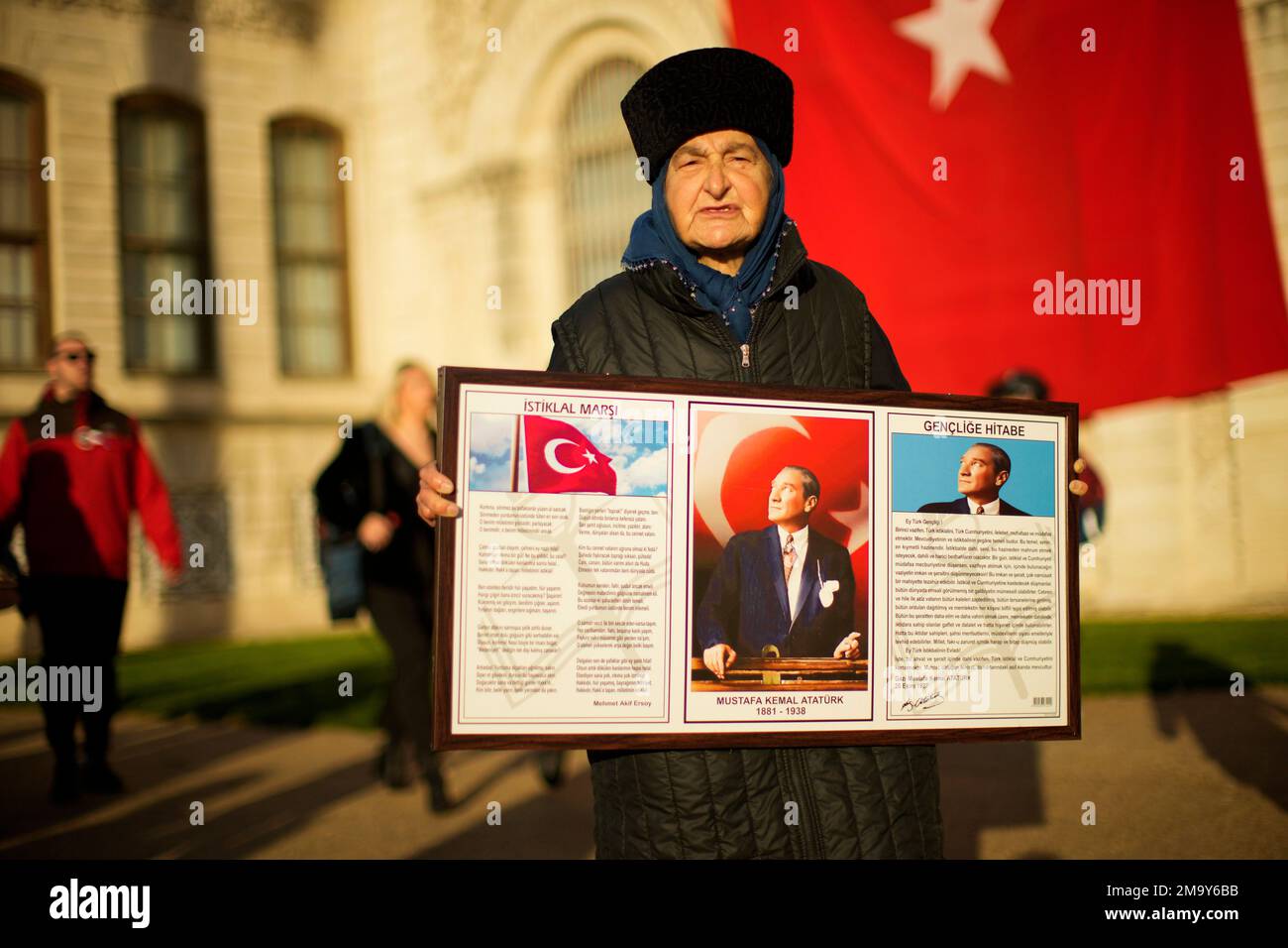 People arrive to pay tribute to Turkey's founding father Mustafa Kemal Ataturk during the 84th ...