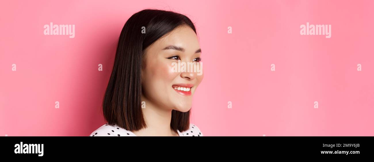 Beauty and skin care concept. Profile of beautiful asian girl smiling ...