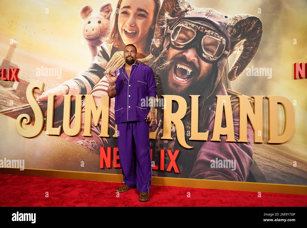 Jason Momoa poses at the premiere of the Netflix film "Slumberland ...