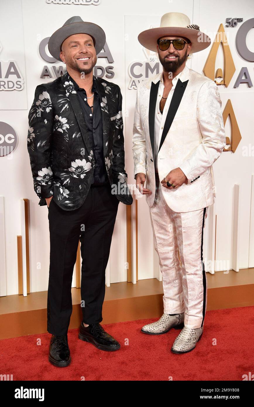 Chris Lucas, left, and Preston Brust, of LoCash, arrive at the 56th ...