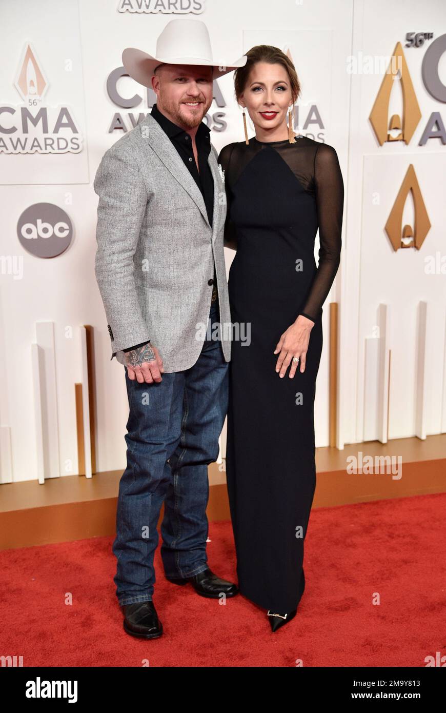 Cody Johnson, left, and Brandi Johnson arrive at the 56th Annual CMA ...