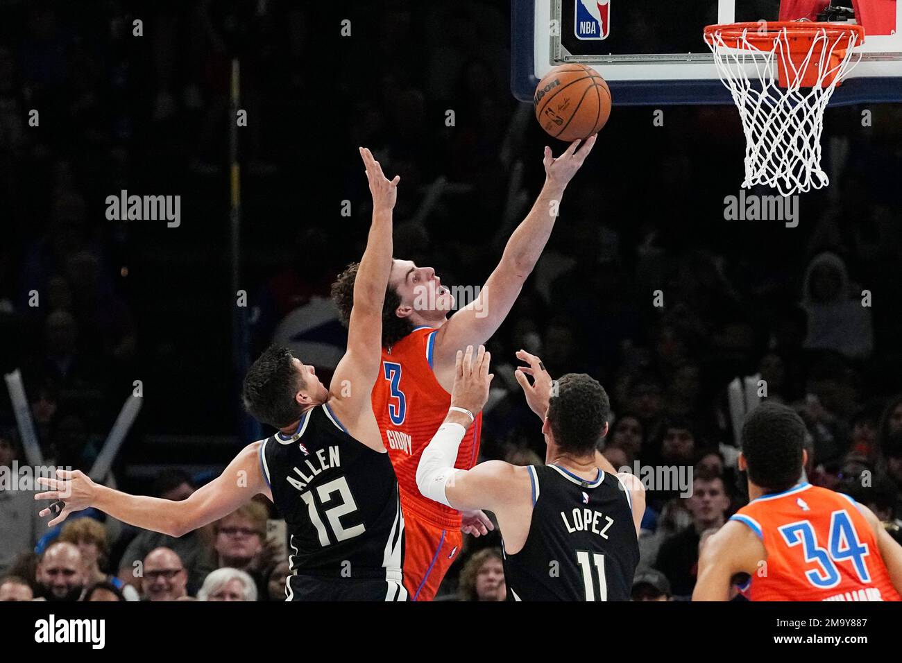 Oklahoma City Thunder guard Josh Giddey (3) shoots between Milwaukee ...