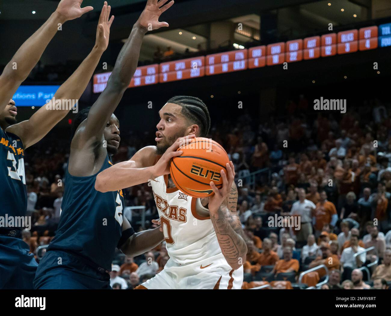 Texas forward Timmy Allen (0) looks to pass against UTEP guard Tae ...