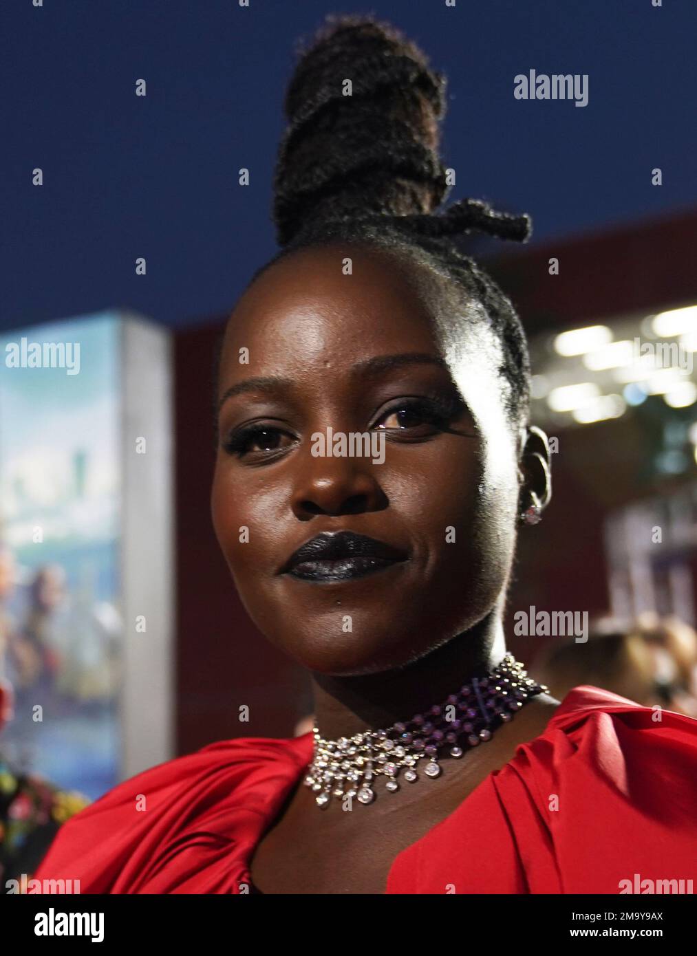 Actor Lupita Nyongo poses on the red carpet at the premiere of Black ...