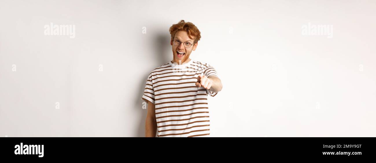 Image of funny redhead guy in glasses laughing at you, pointing finger ...