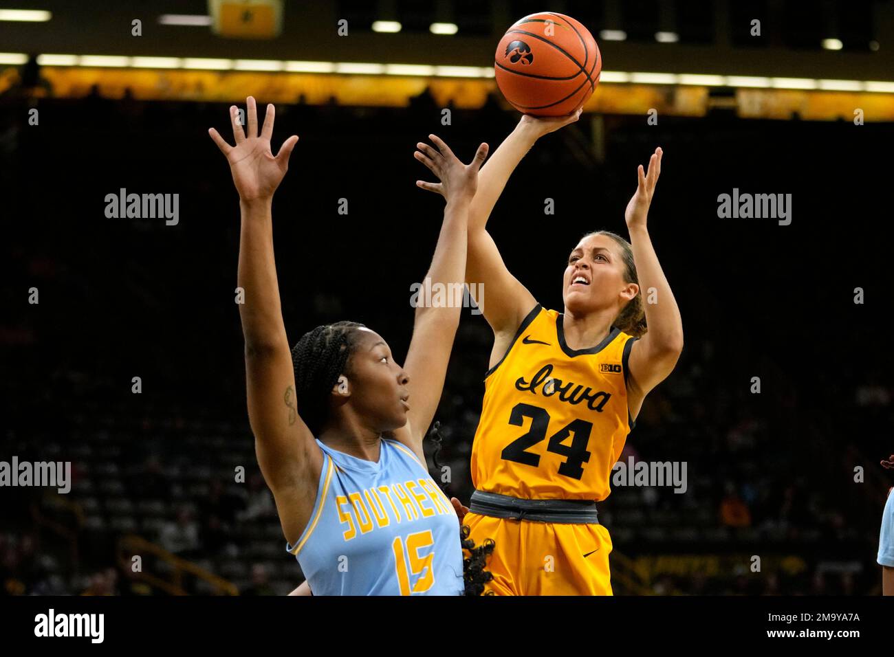 Iowa guard Gabbie Marshall (24) shoots over Southern forward Sky Castro ...