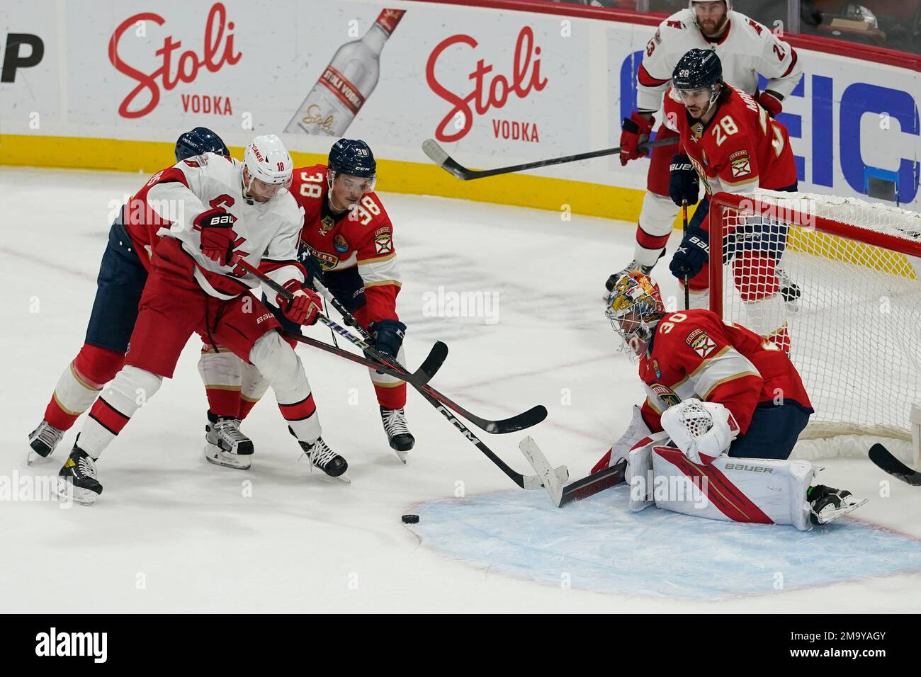 Florida Panthers goaltender Spencer Knight (30) defends the net from a ...
