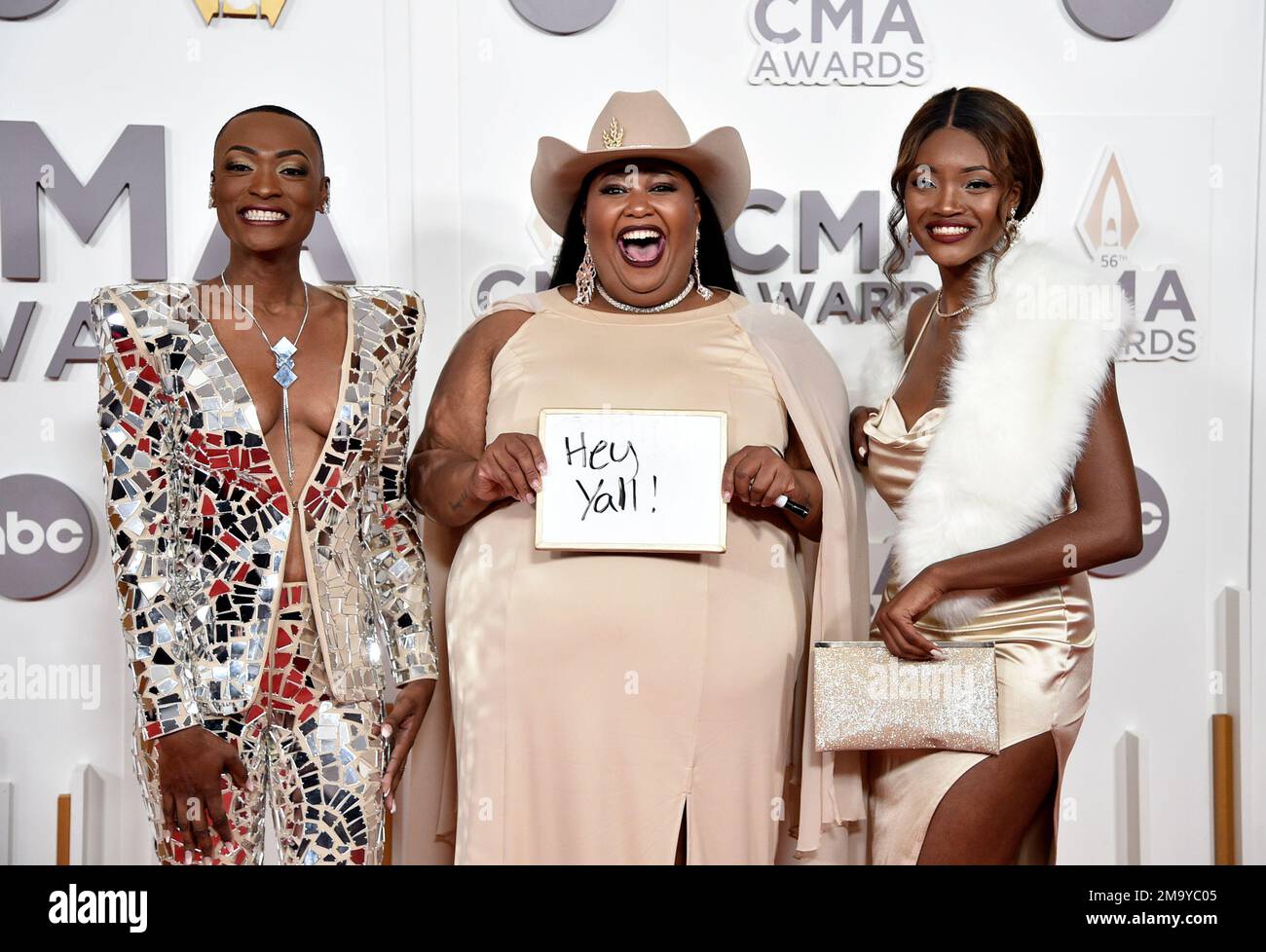 Trea Swindle, from let, Danica Hart and Devynn Hart, of Chapel Hart, arrive at the 56th Annual ...