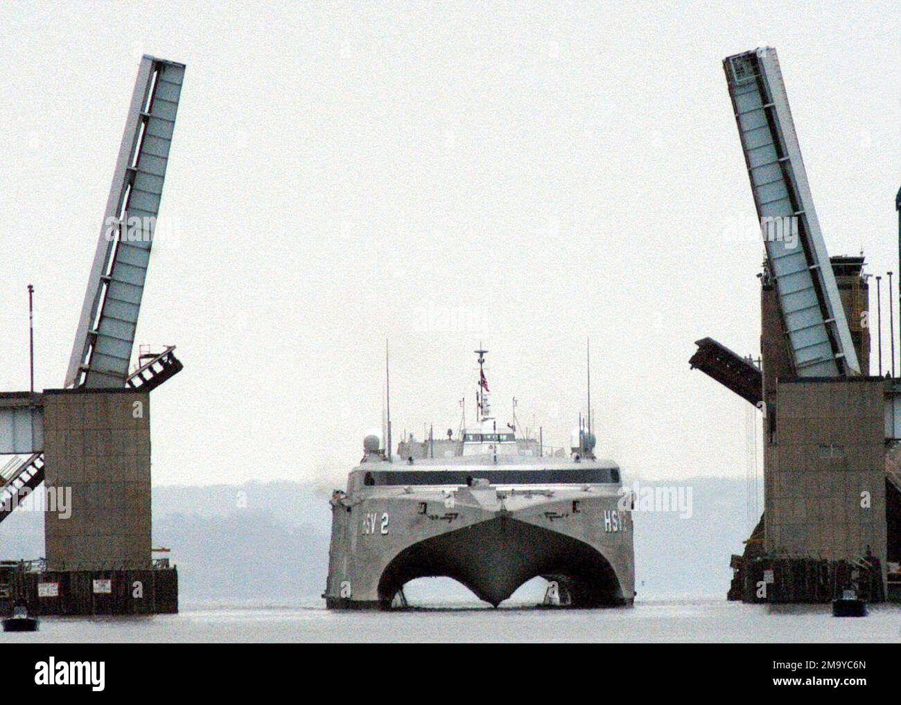 The Woodrow Wilson Bridge lifts opens to let the High Speed Vessel 2 ...