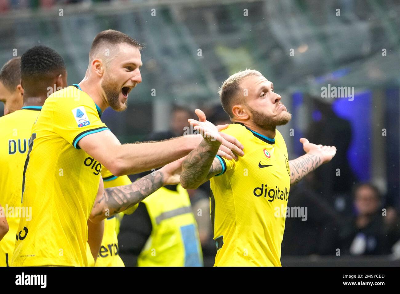 Inter Milan's Federico Dimarco, right, celebrates after scoring his ...