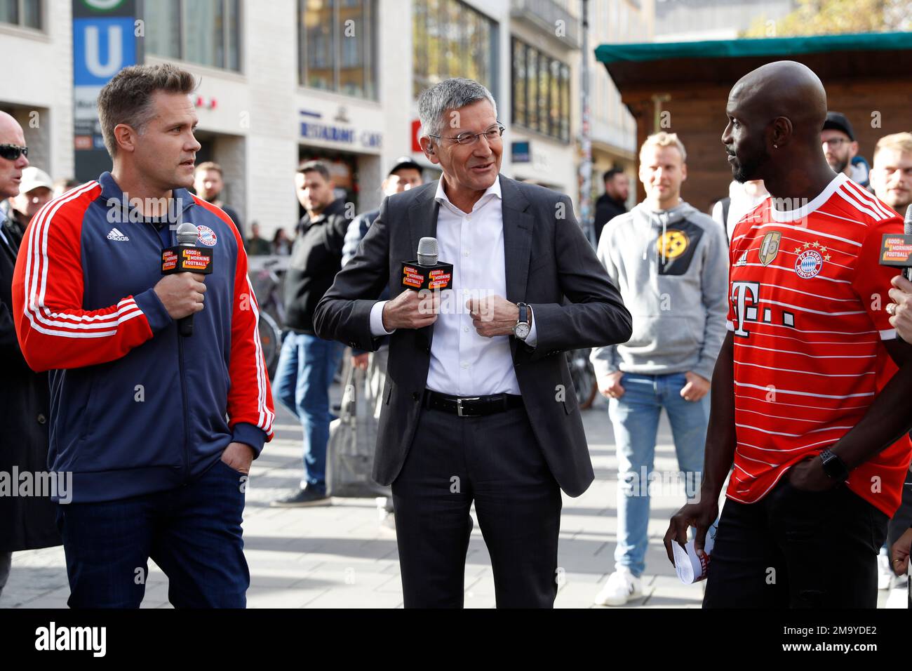 From left, Kyle Brandt, president of FC Bayern Munich Herbert Hainer ...