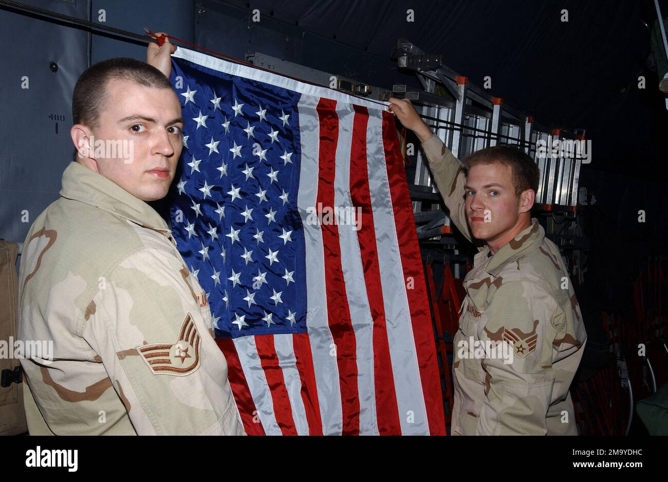 US Air Force (USAF) STAFF Sergeant (SSGT) Kevin Lucas (left) and SENIOR ...