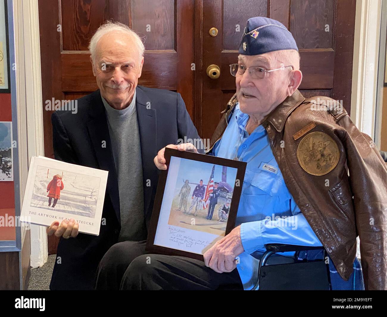 Artist Paul Steucke Sr presents WWII pilot Lt. Col. (Ret.) Clayton M ...