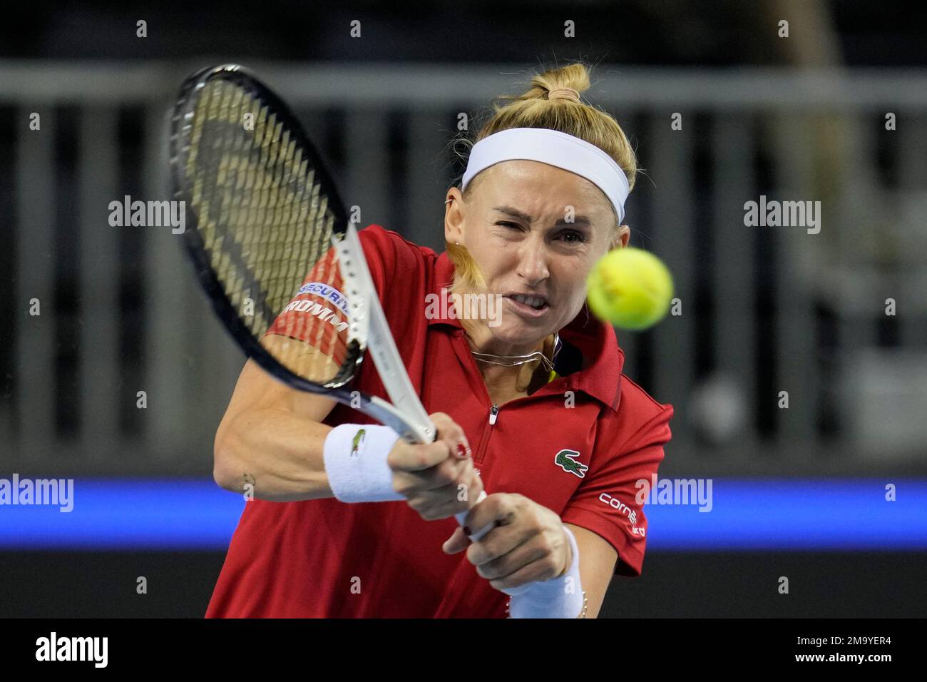 Jil Teichmann of Switzerland returns a ball to Elisabetta Cocciaretto ...