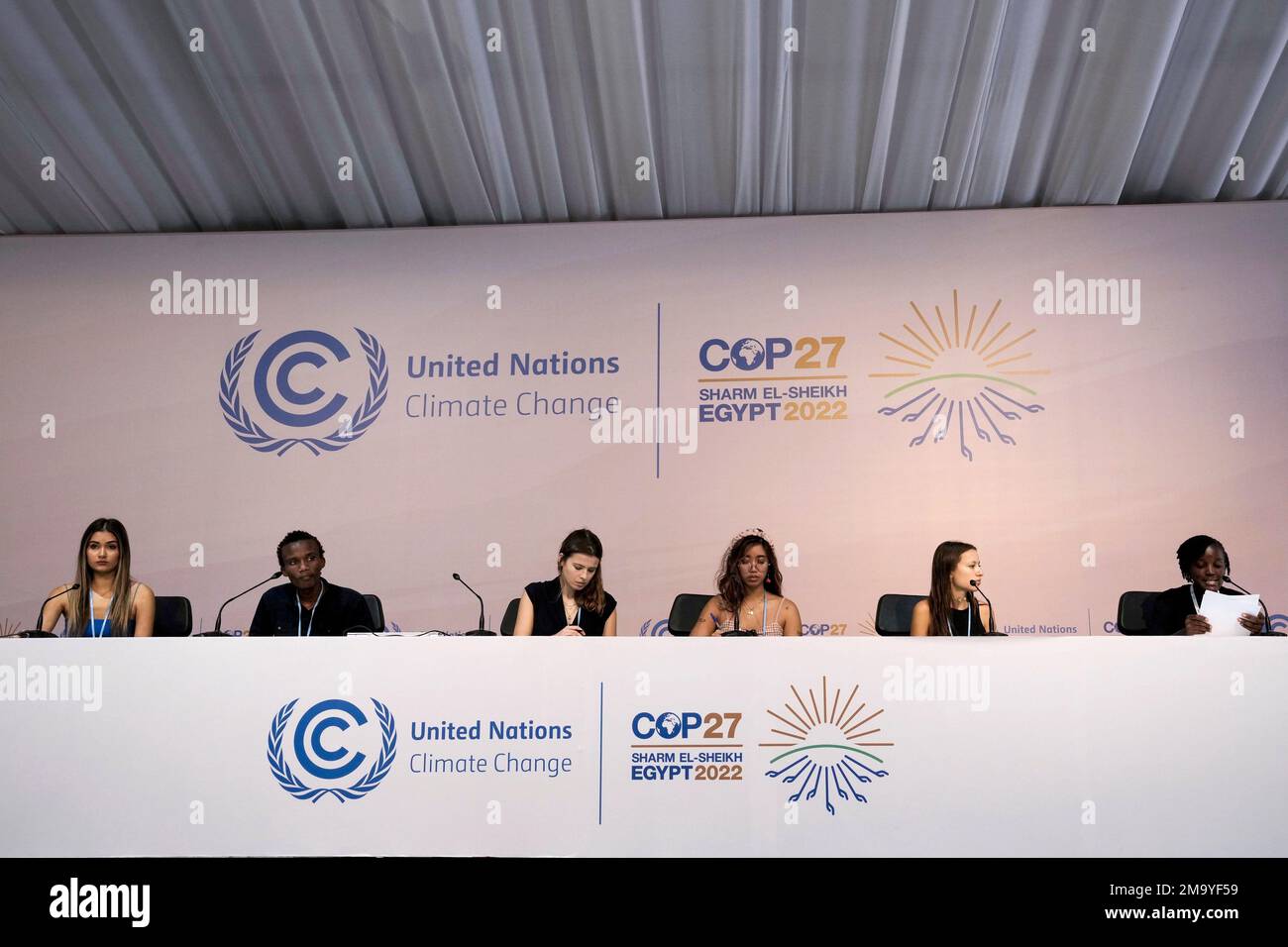 Vanessa Nakate, Ugandan climate activist, right, speaks on a panel with ...