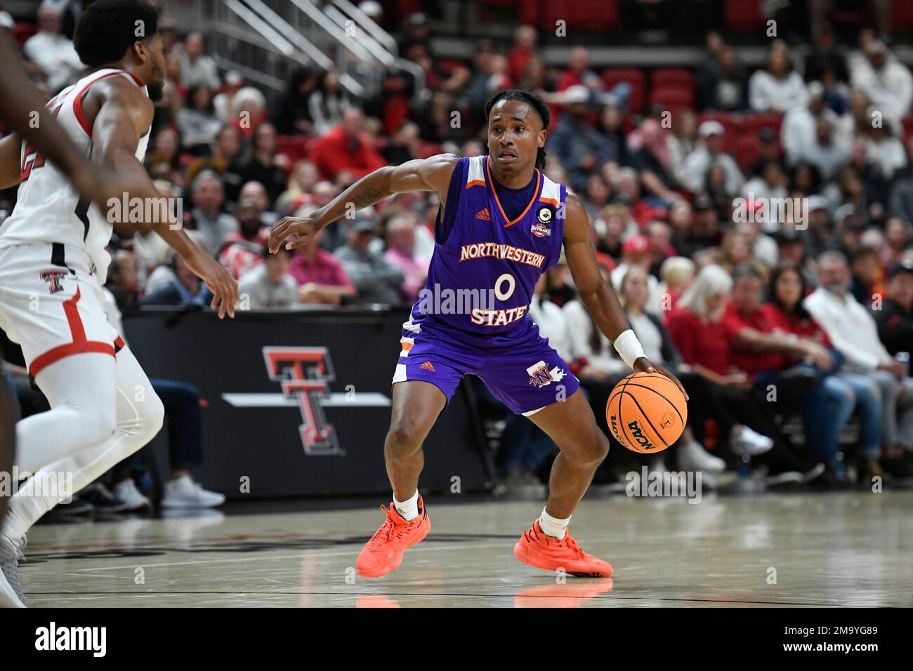 Northwestern State guard Demarcus Sharp (0) controls the ball against ...