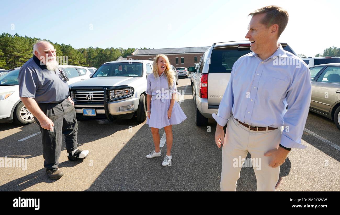 U.S. Rep. Michael Guest, R-Miss., and his wife Haley Guest, center ...