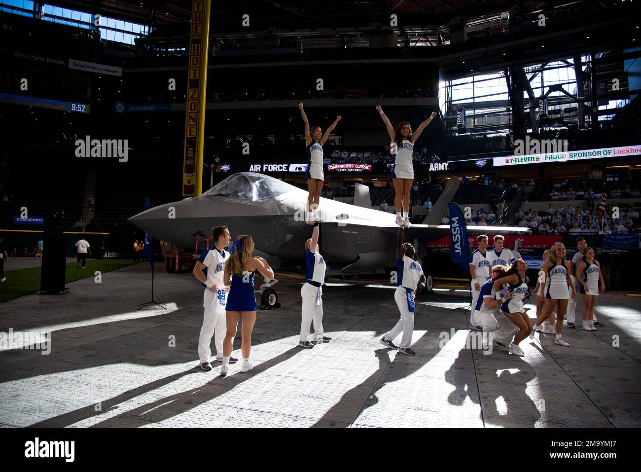 Members of the Air Force cheer team practice their routine prior to the ...
