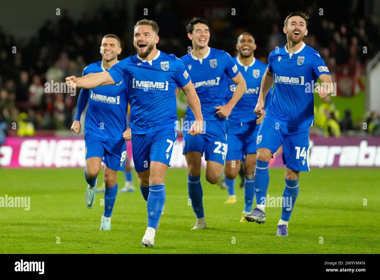 Gillingham players celebrate winning on penalties against Brentford ...