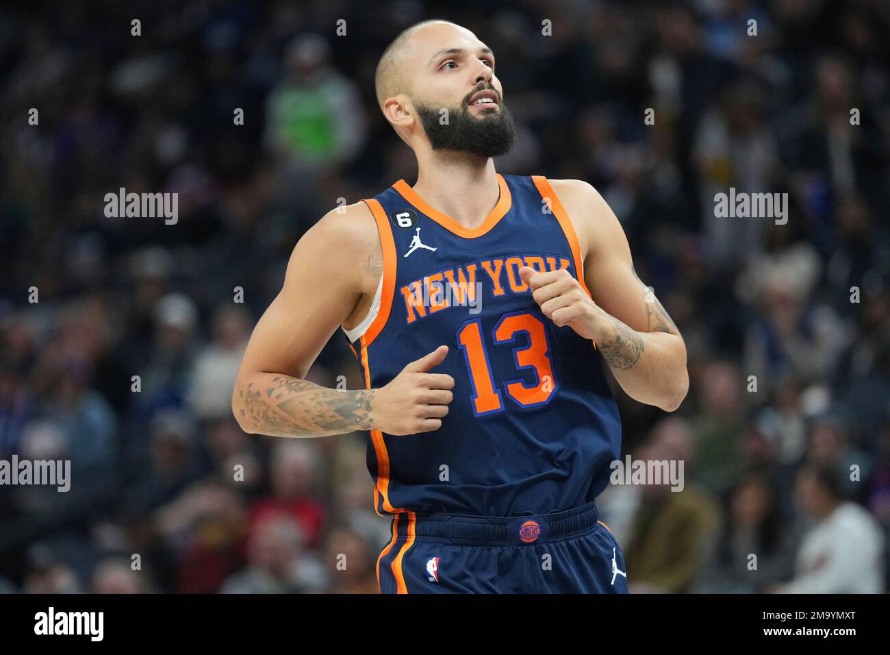 New York Knicks guard Evan Fournier (13) jogs down the court during the ...